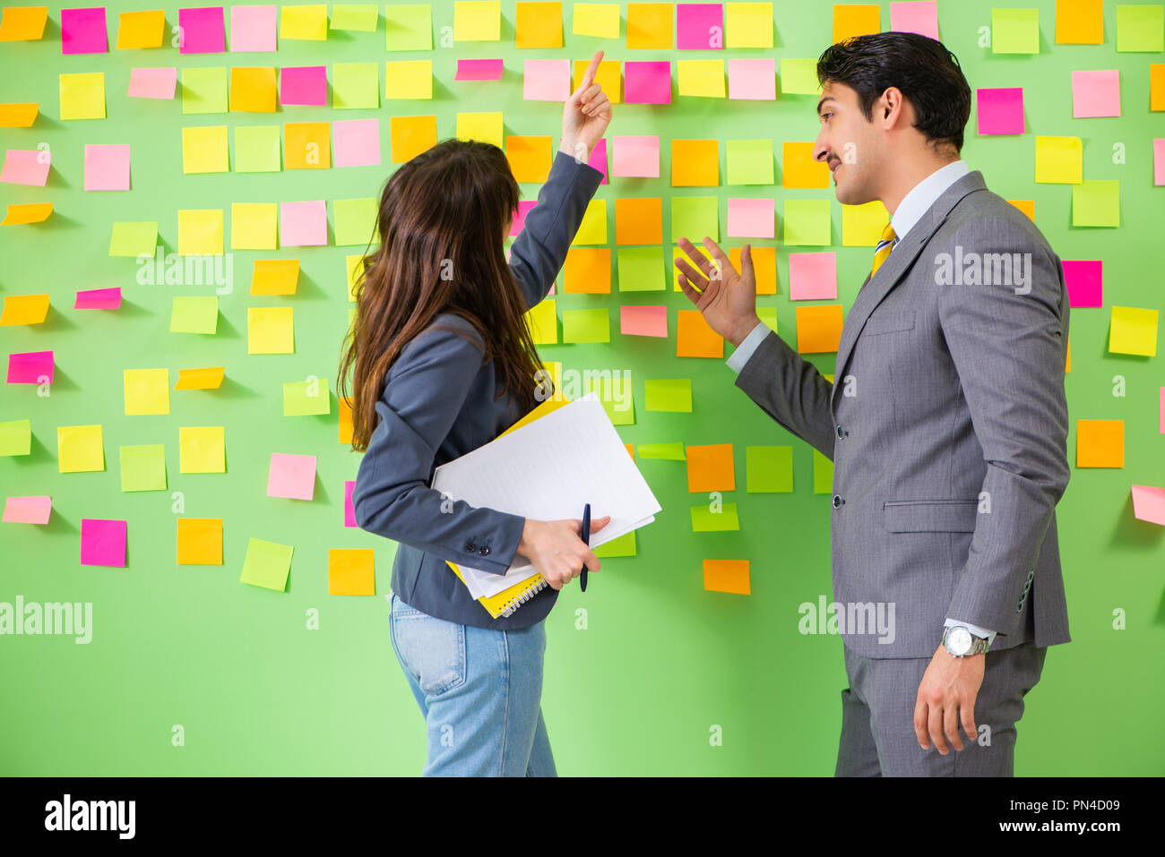 Business colleagues discussing future priorities Stock Photo - Alamy