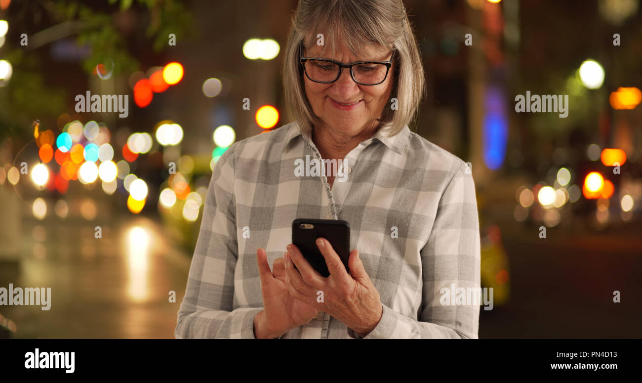 Old lady phone night hi-res stock photography and images - Alamy