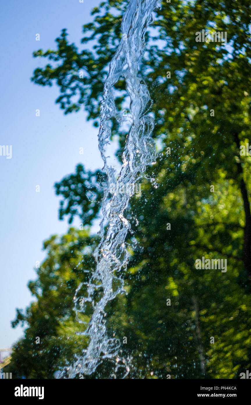 transparent falling water vertical flows, close up Stock Photo - Alamy