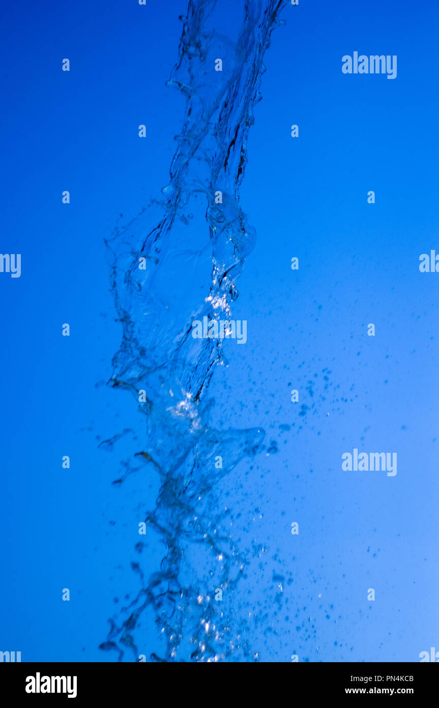 transparent falling water vertical flows, close up Stock Photo - Alamy