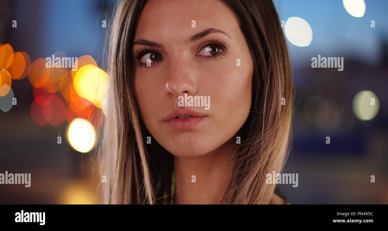 Beautiful White Girl In Her 20s With Long Brown Hair Alone On Bokeh