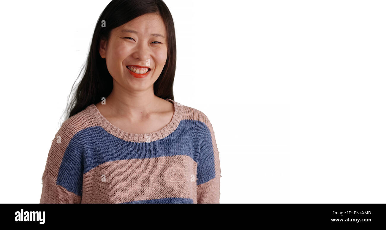 Smiling female millennial looking at camera isolated on white ...