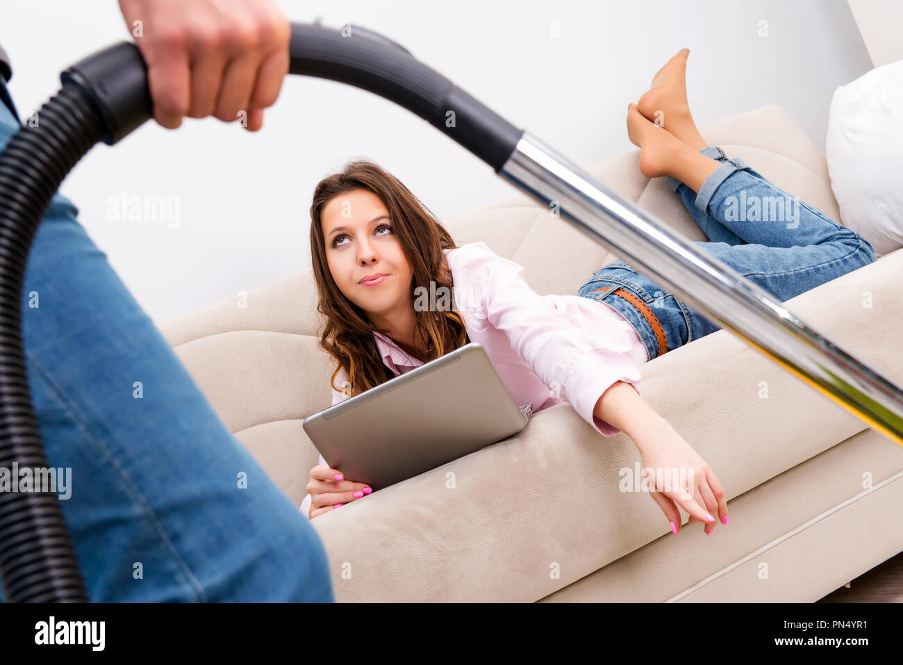Cleaning the house with vacuum cleaner Stock Photo - Alamy
