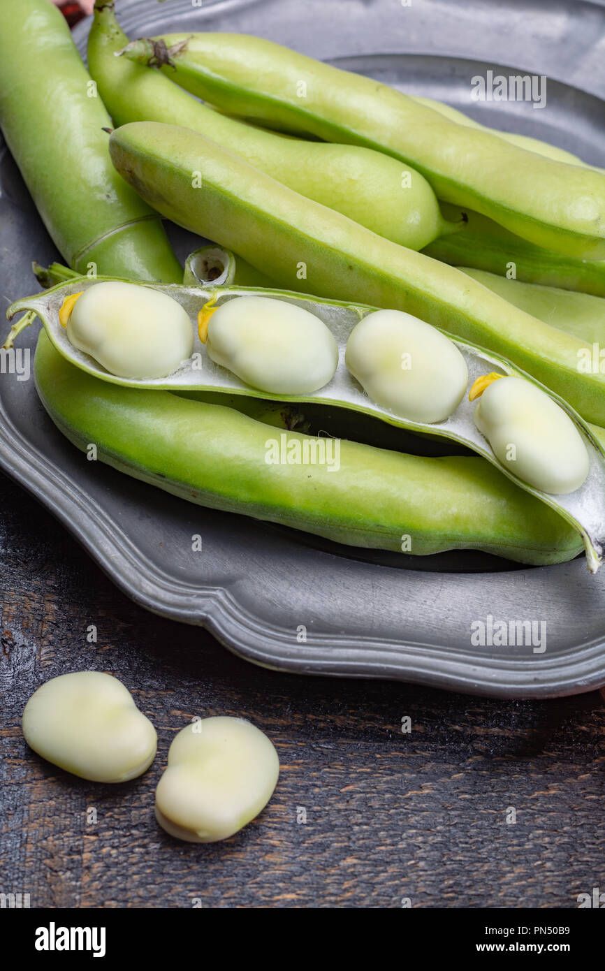 New harvest of healthy vegetables, green fresh raw big broad beans ...