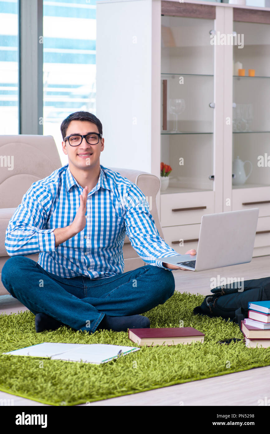 Student meditating and preparing for university exams Stock Photo - Alamy