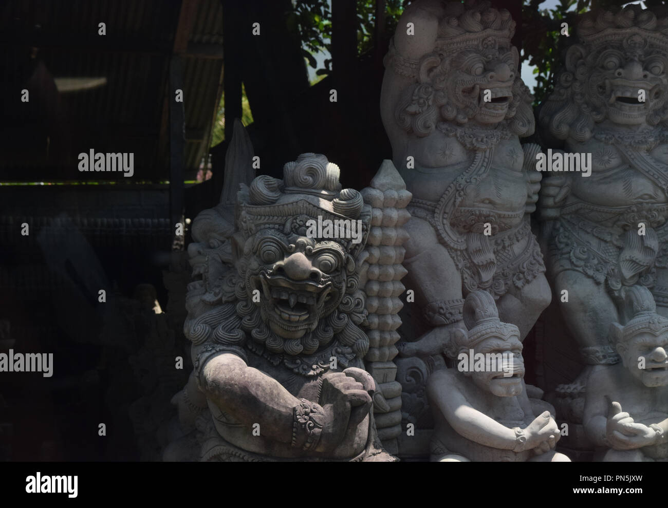 Balinese stone carvings Stock Photo - Alamy