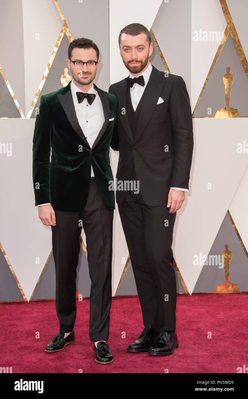 Oscar®-nominee Sam Smith and guest arrive at The 88th Oscars® at the ...