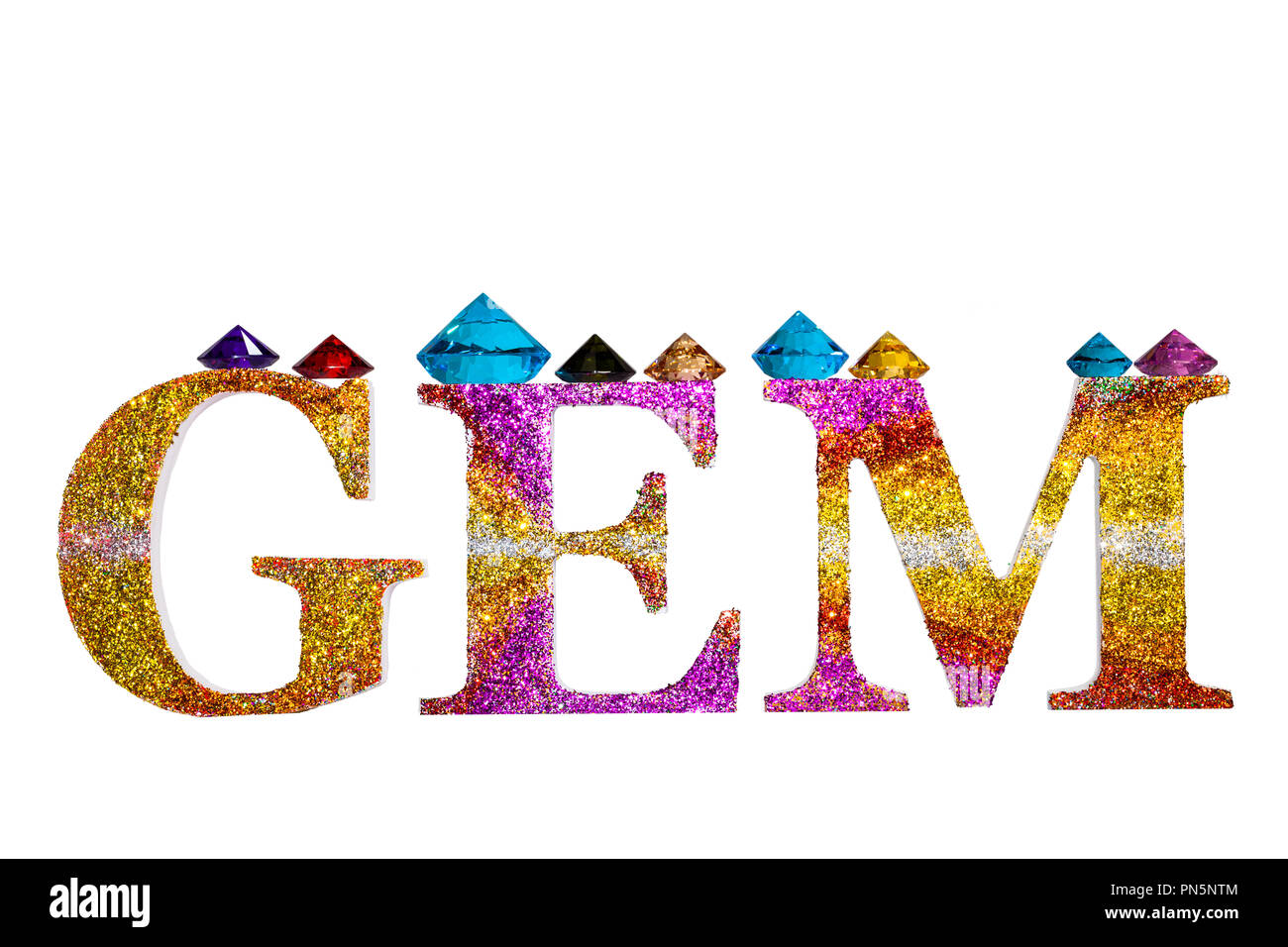 glitter gem letters with gemstones on isolated background with copy ...