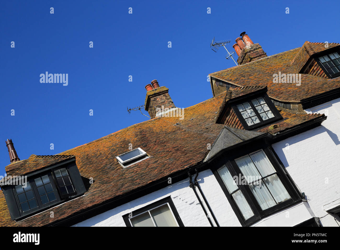 Line of rooftop windows hi-res stock photography and images - Alamy