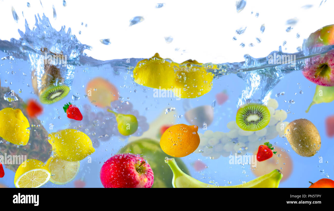 Fresh Fruits shot as they submerged under water background food ...