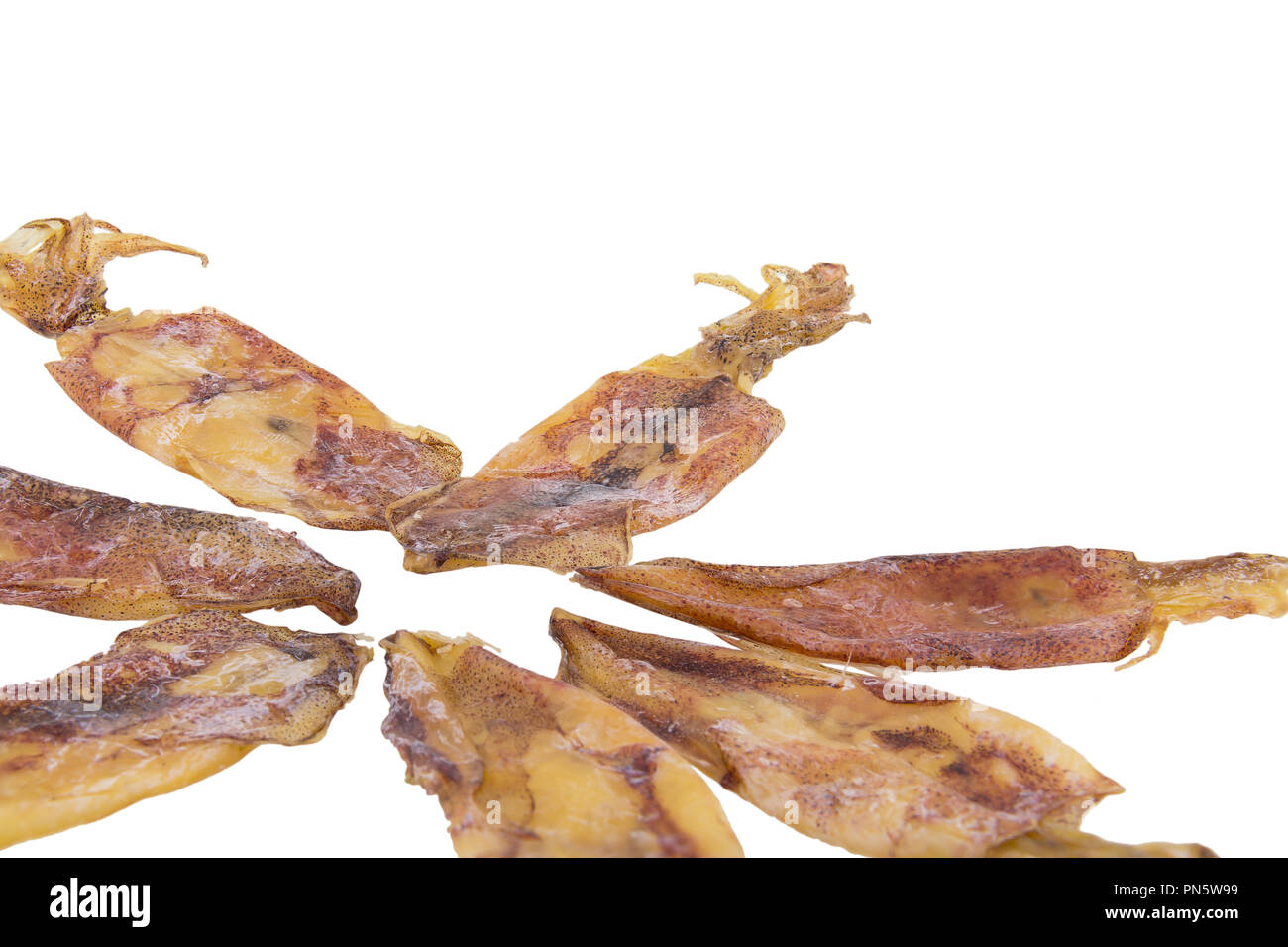 Dried squid isolated on white background Stock Photo - Alamy