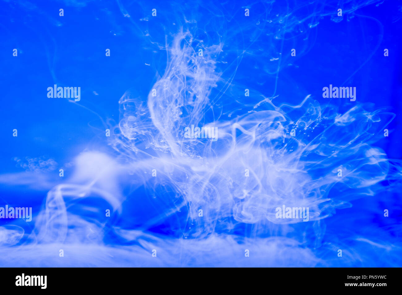 Ink in water multicolor abstract background texture Stock Photo - Alamy