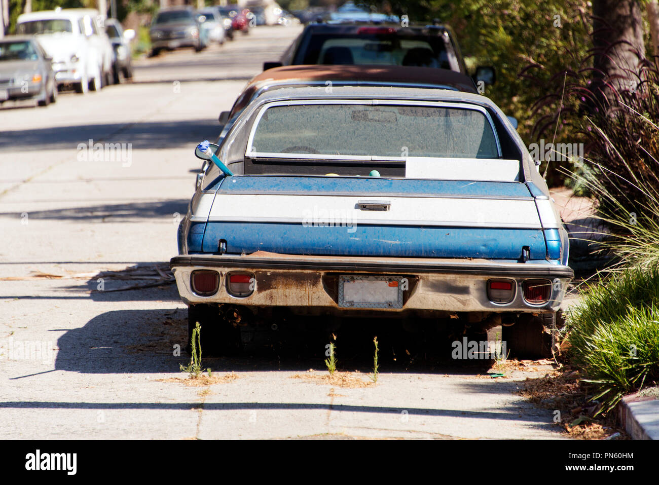 A view of vintage classic American pick up trucks cars in the street ...