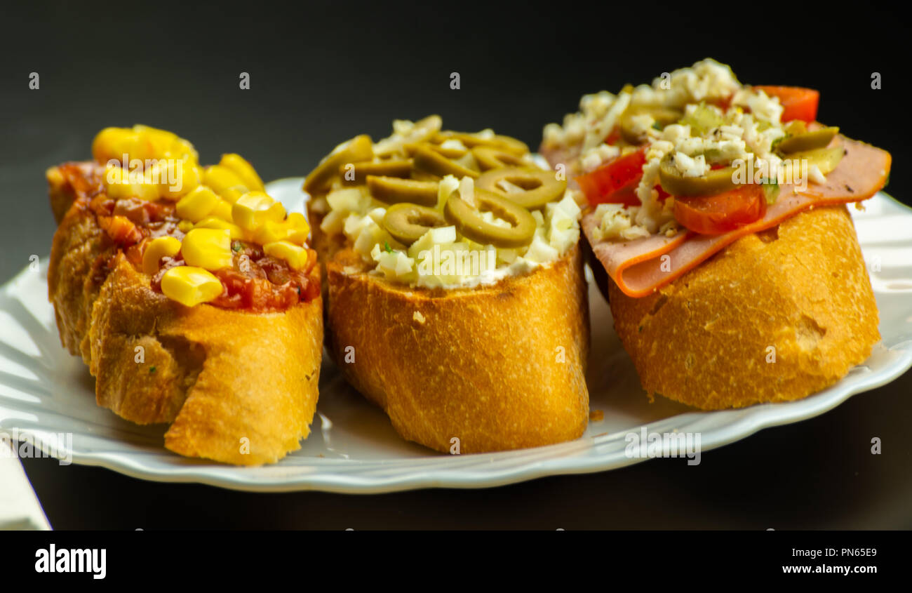 traditional spanish tapas for lunch table, mini sandwiches food set ...