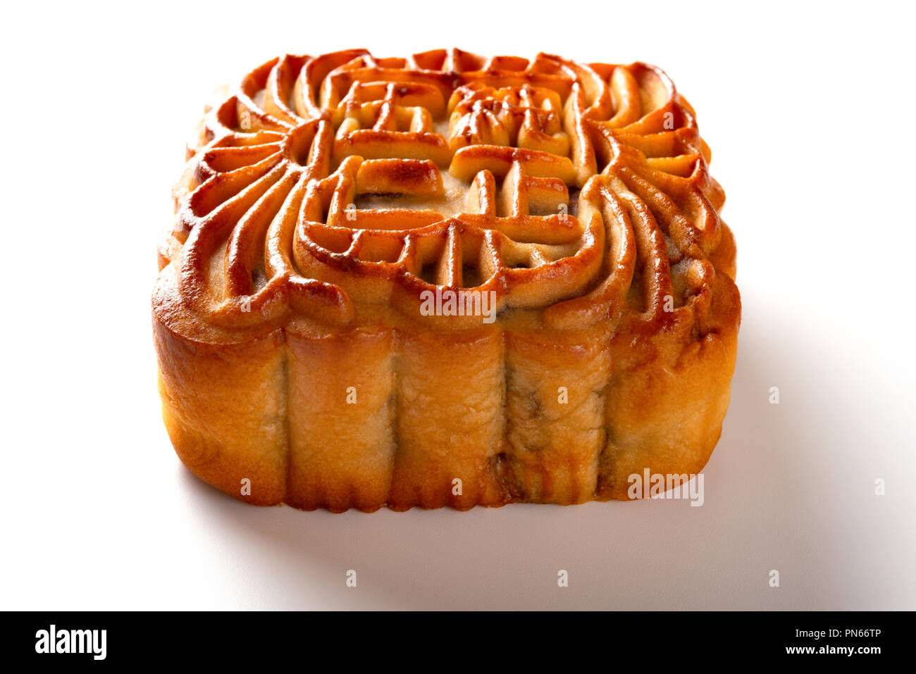 side view studio shot of traditional style Chinese mooncake the Chinese ...