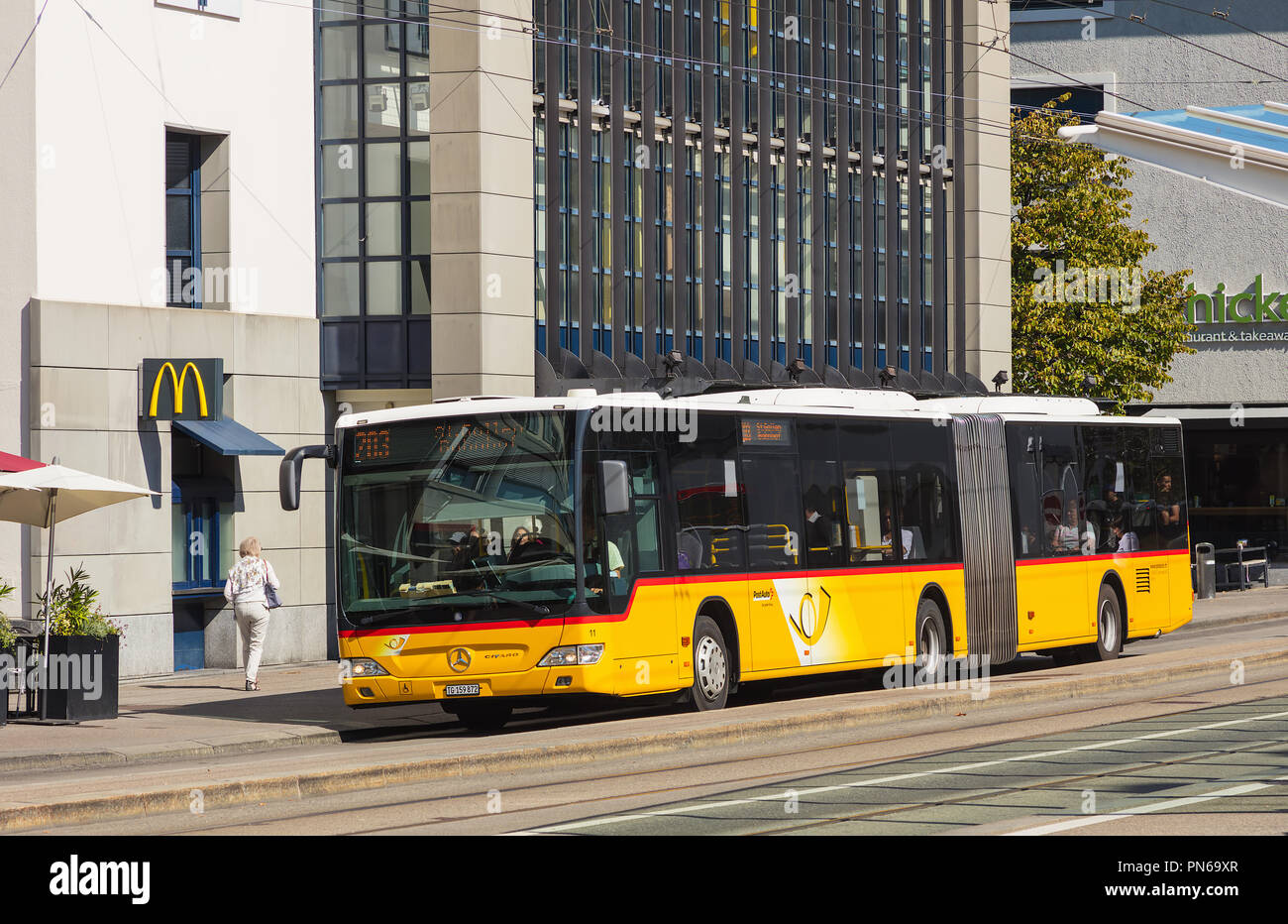 St. Gallen, Switzerland - September 19, 2018: a PostAuto bus at the ...