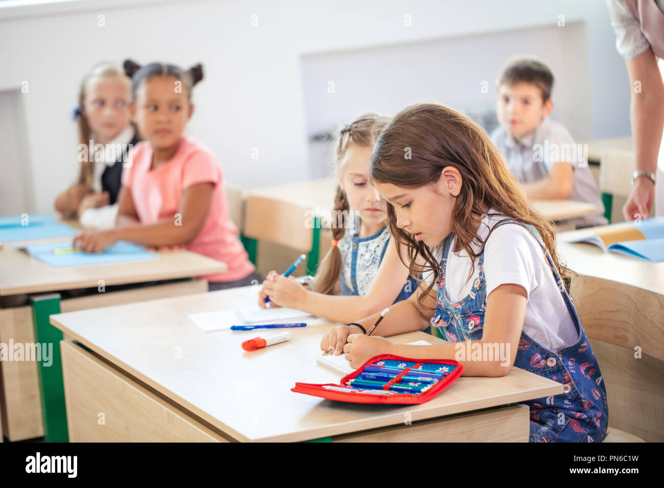 school children are participating actively in class. Education ...