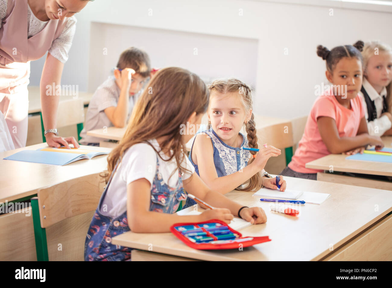school children are participating actively in class. Education ...