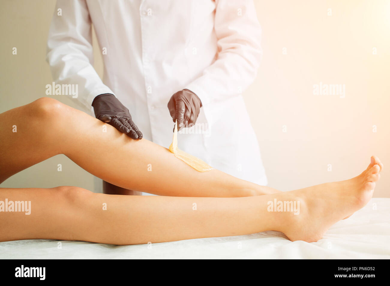 Waxing stick hi-res stock photography and images - Alamy