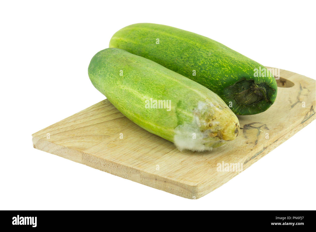 Rotten cucumber isolated on the white background Stock Photo - Alamy