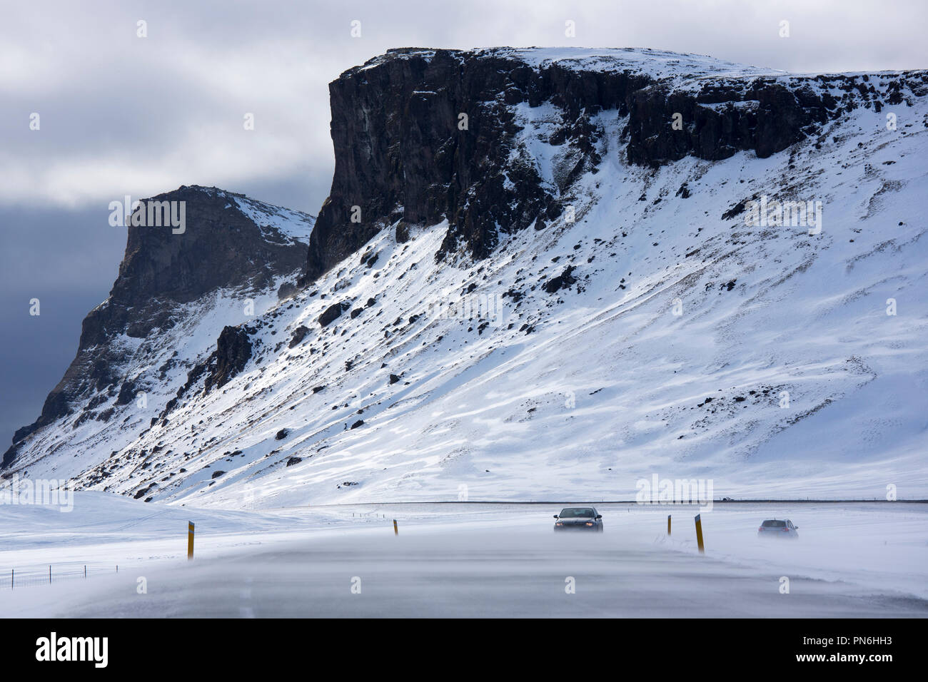 Drifting snow makes motoring conditions difficult by snow-covered ...