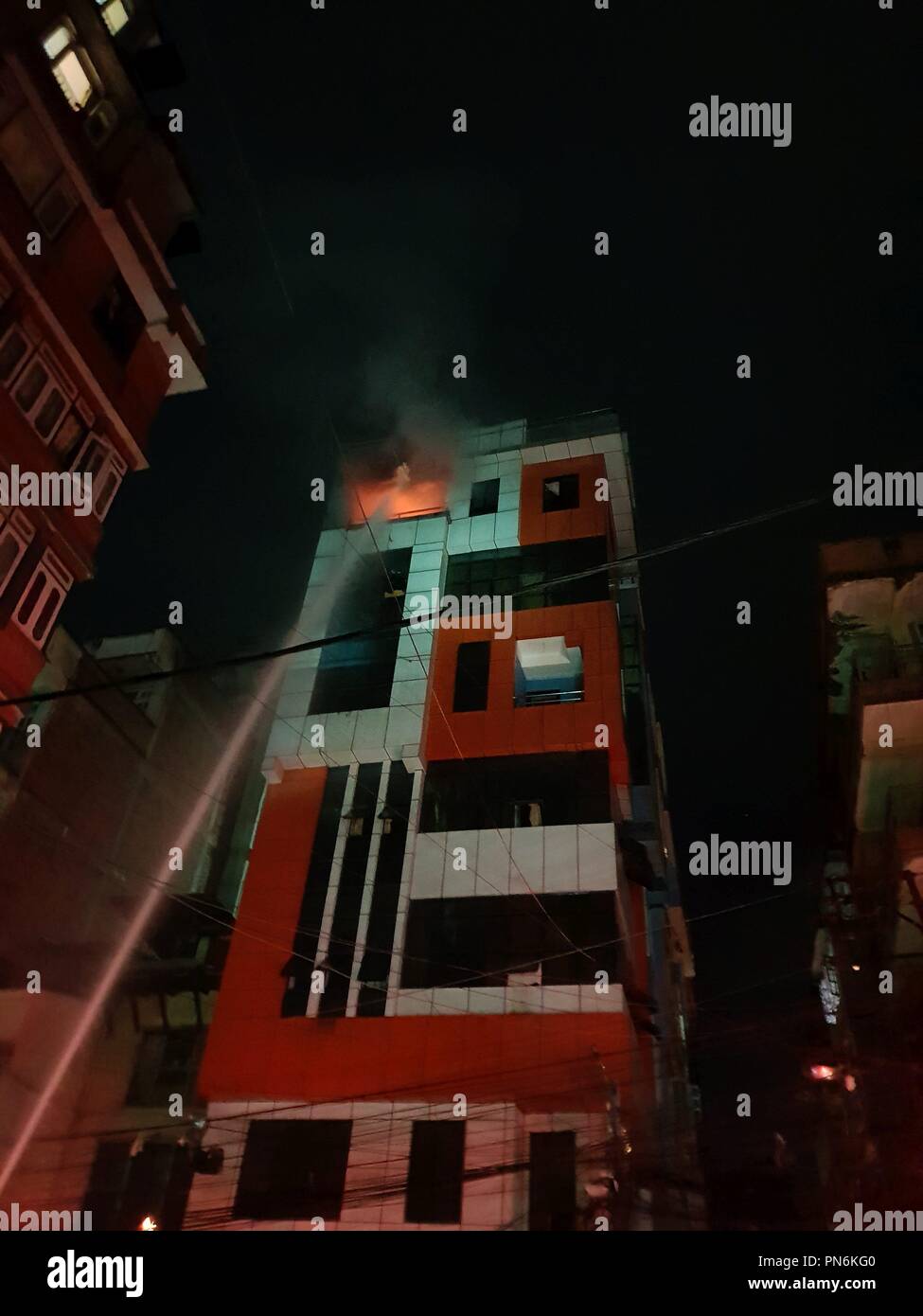 Kathmandu. 19th Sep, 2018. A fire breaks out at a building in Nepali ...