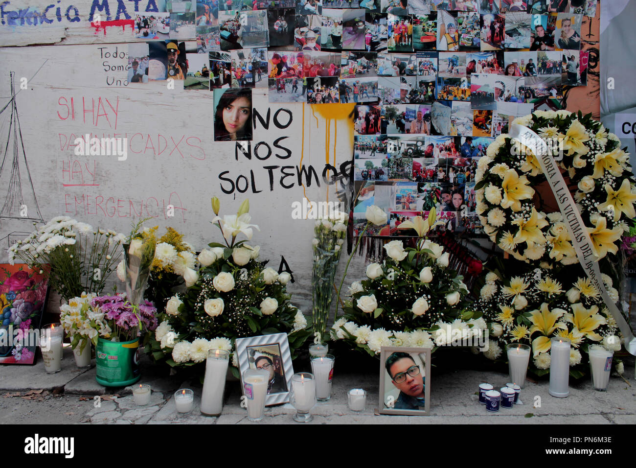 Mexico City, Mexico. 19th Sep, 2018. Flowers, candles, photos and ...