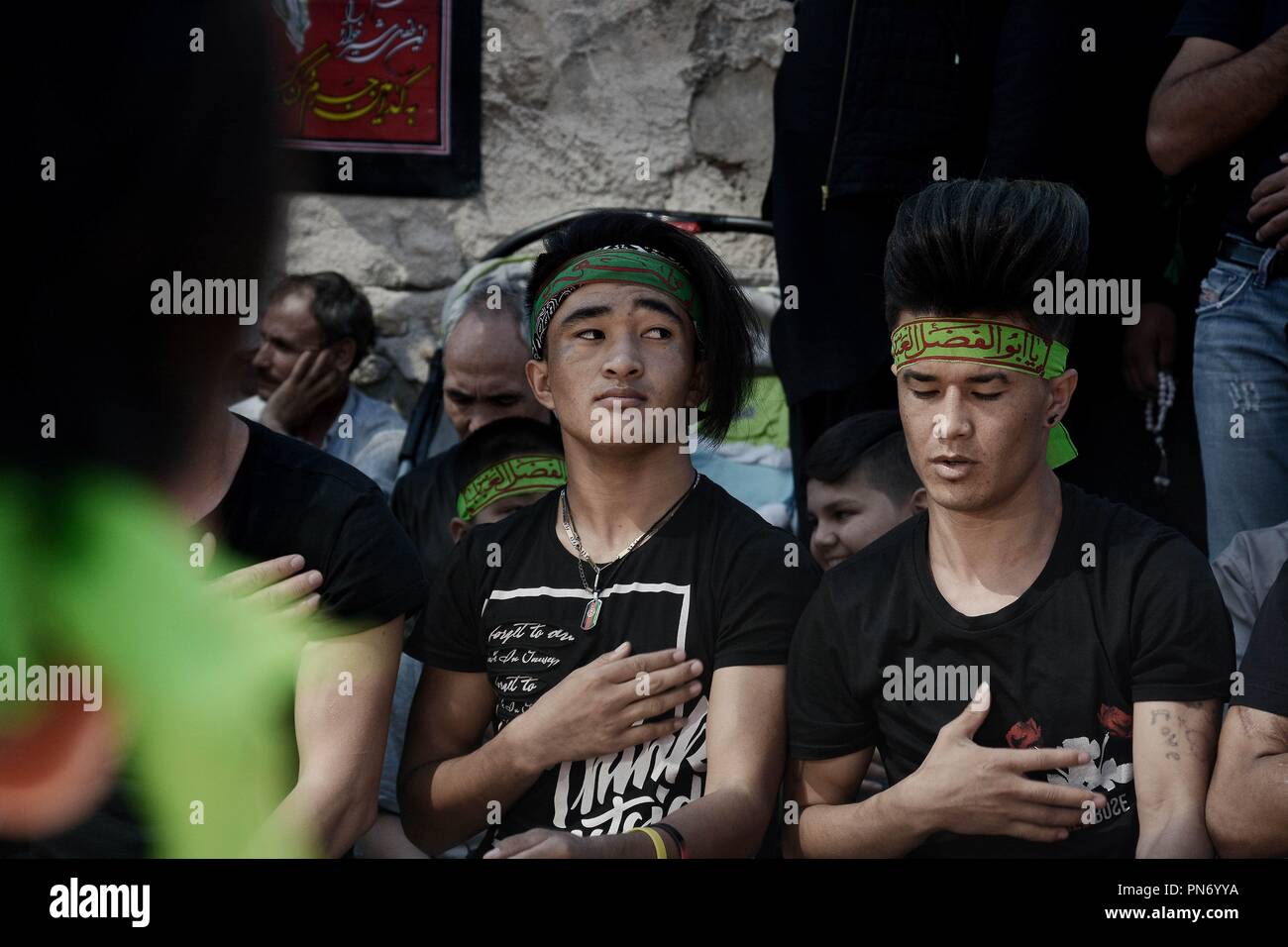 Piraeus, Greece. 20th Sep, 2018. Shia Muslim youths seen holding their ...