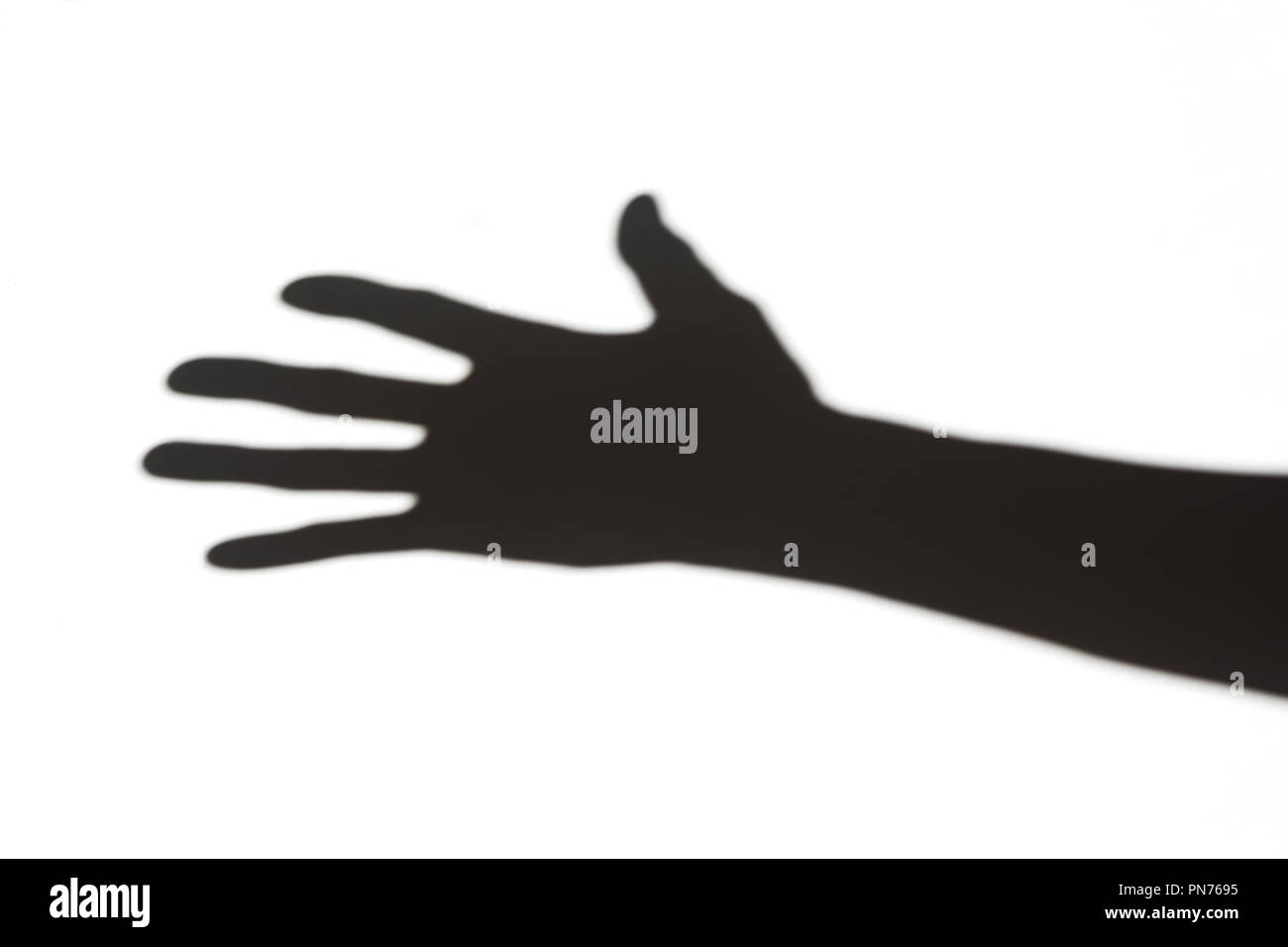 Hand shadow on wall hi-res stock photography and images - Alamy