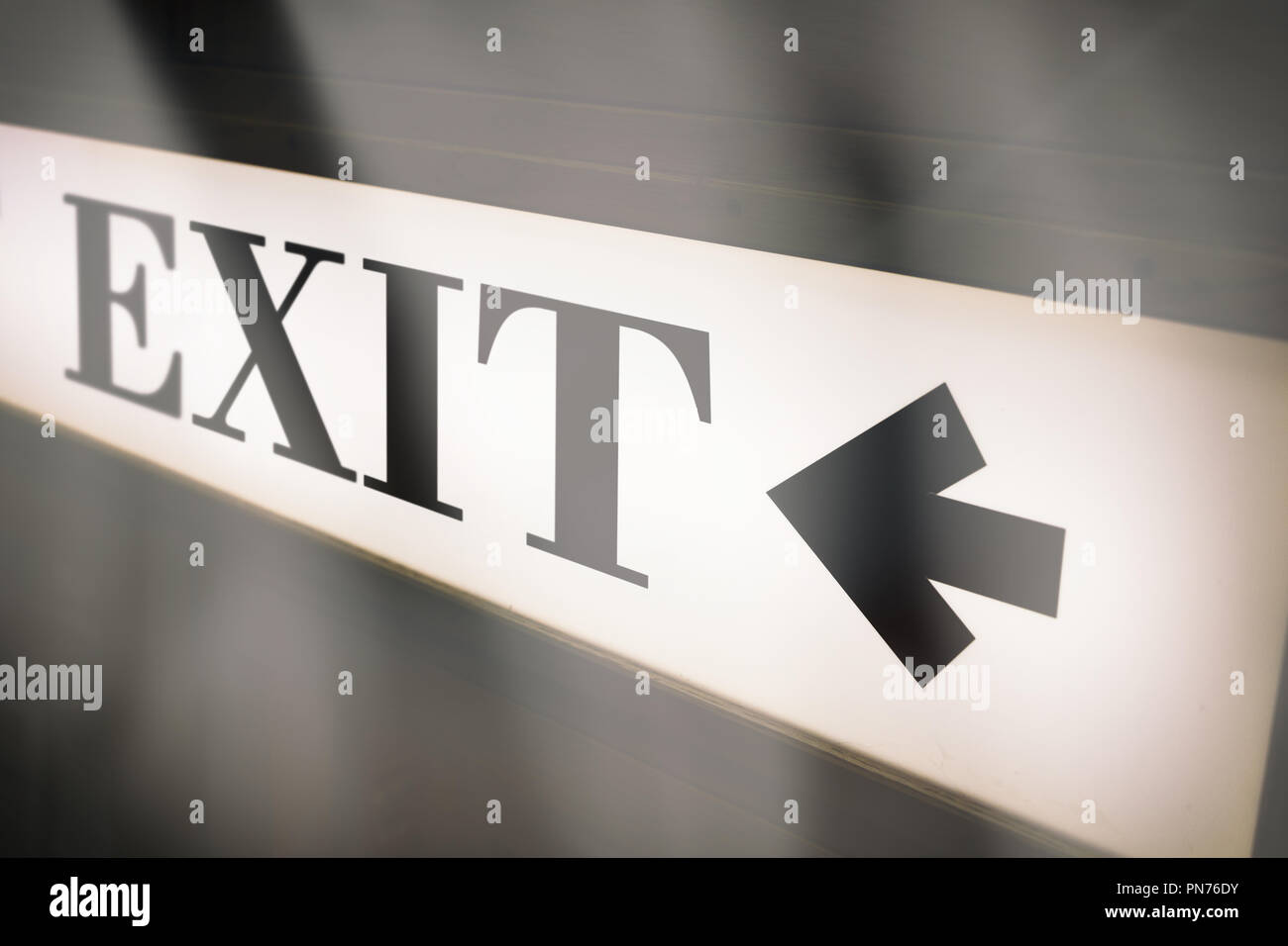 sign of word exit and direction arrow Stock Photo - Alamy
