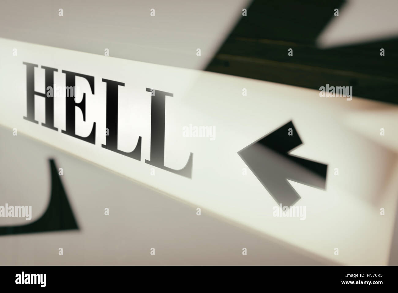 sign of word hell and direction arrow Stock Photo - Alamy