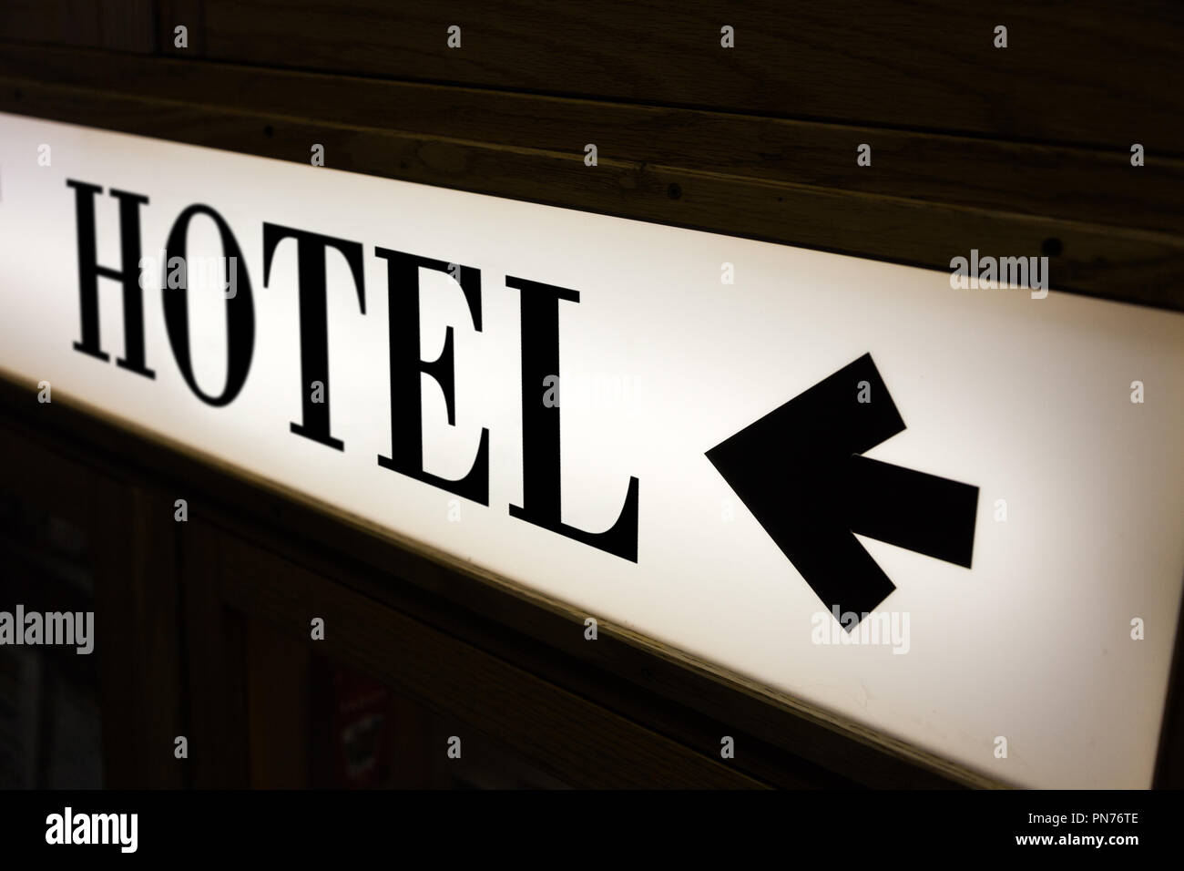 sign of word hotel and direction arrow Stock Photo - Alamy
