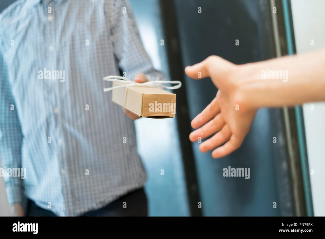 Recieving home delivery hi-res stock photography and images - Alamy