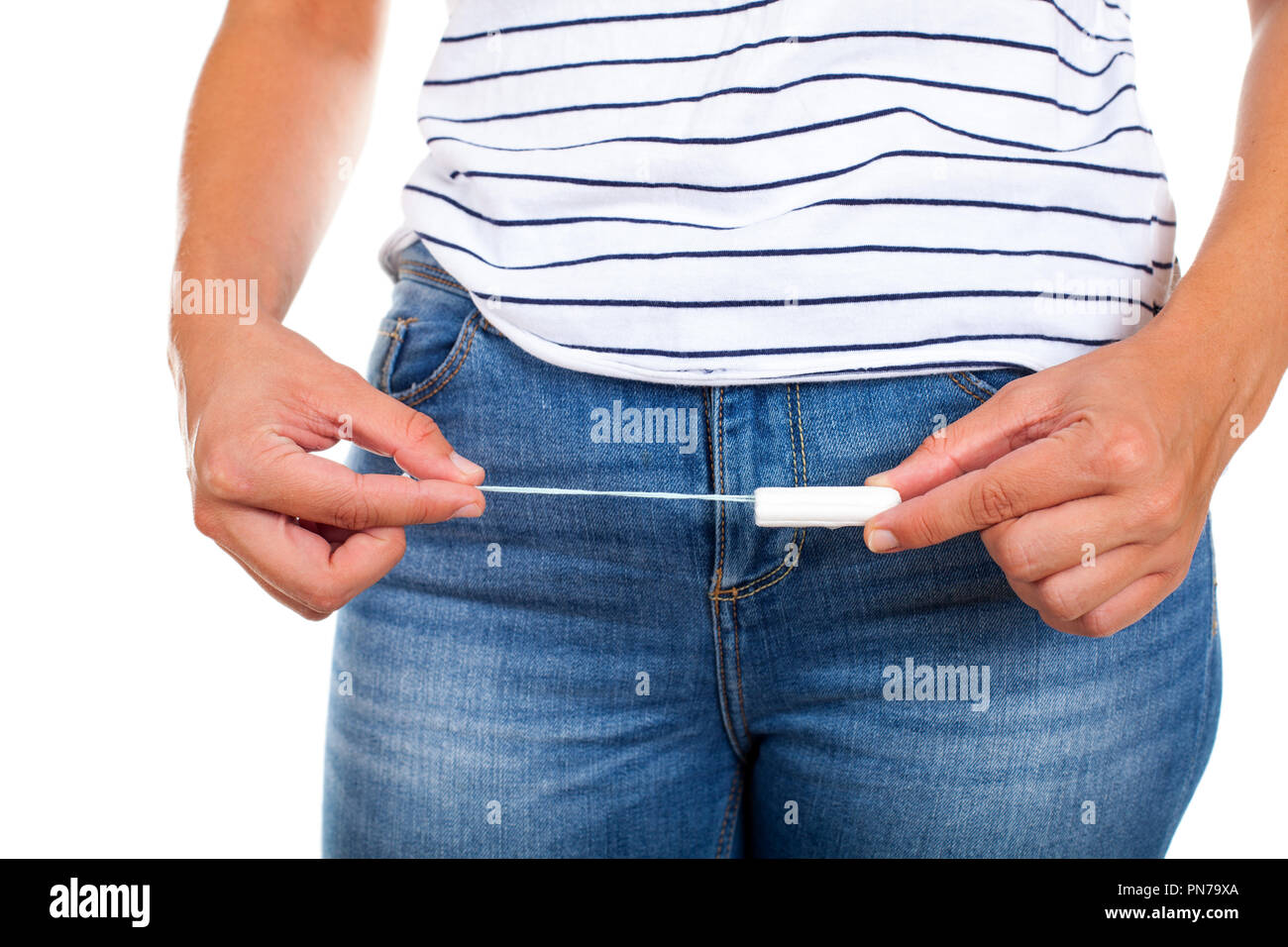 Close up picture of female hands holding cotton tampon for menstrual ...