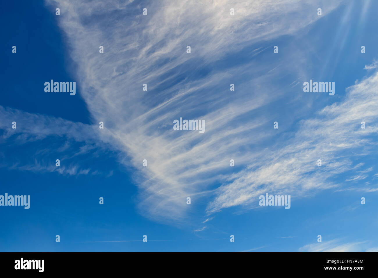Sparse clouds in the blue sky morning background. Fluffy clouds in the ...