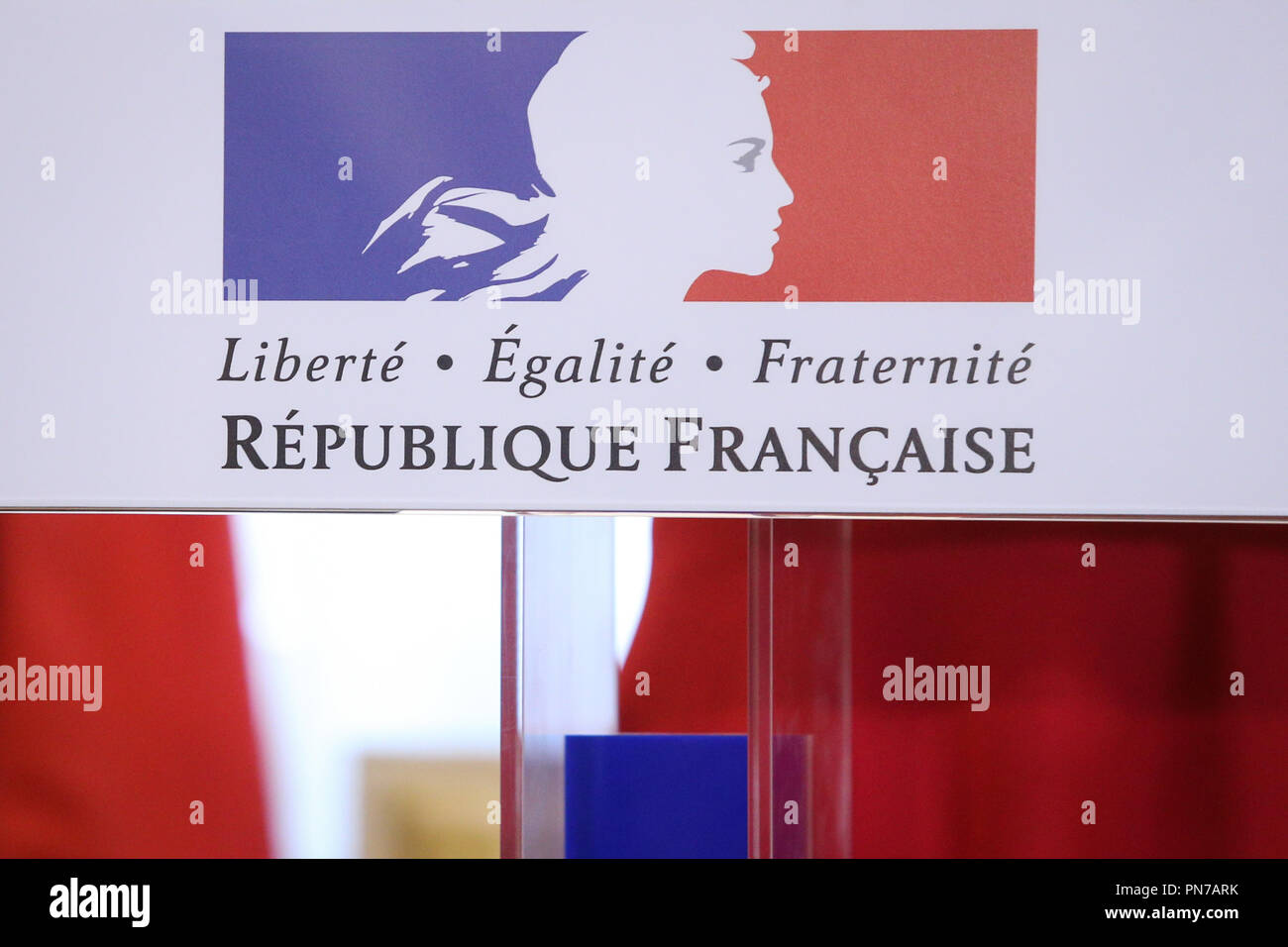 Motto of the French Republic on a cardboard sign "Liberty, Equality ...