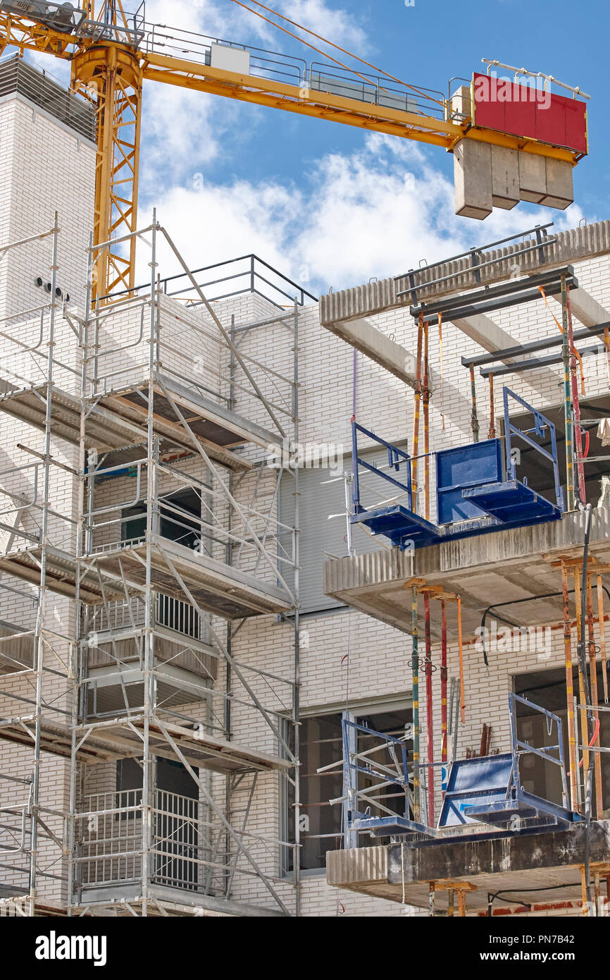 Building under construction. Crane machinery structure. Industry ...