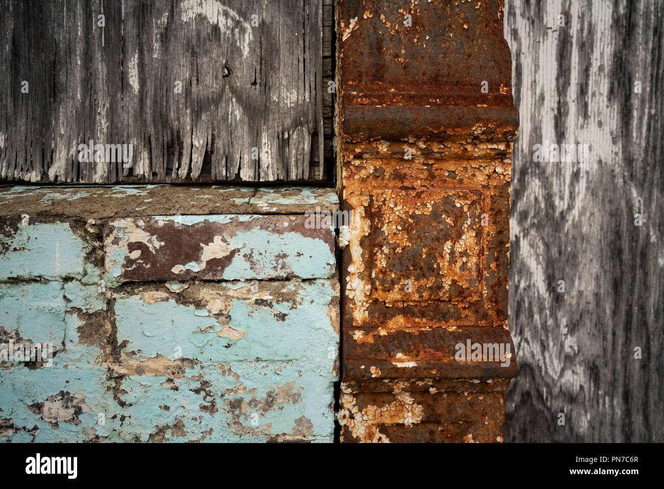 A century old building shows the age an erosion with dried wood and ...