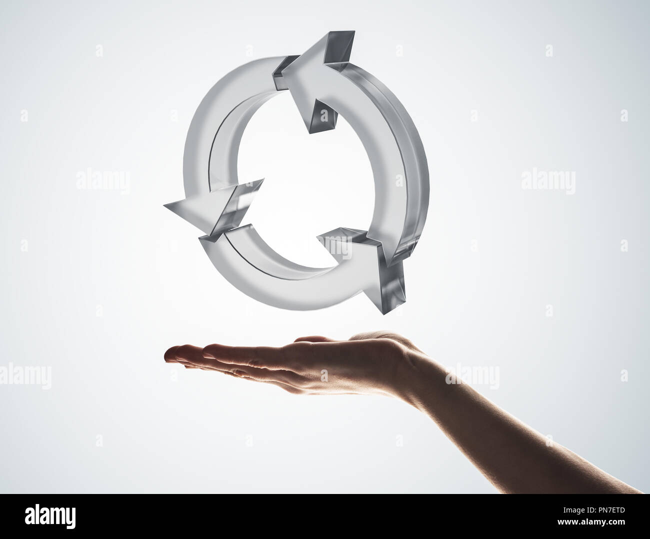 Concept of reuse and recycle presented by glass icon in palm Stock ...