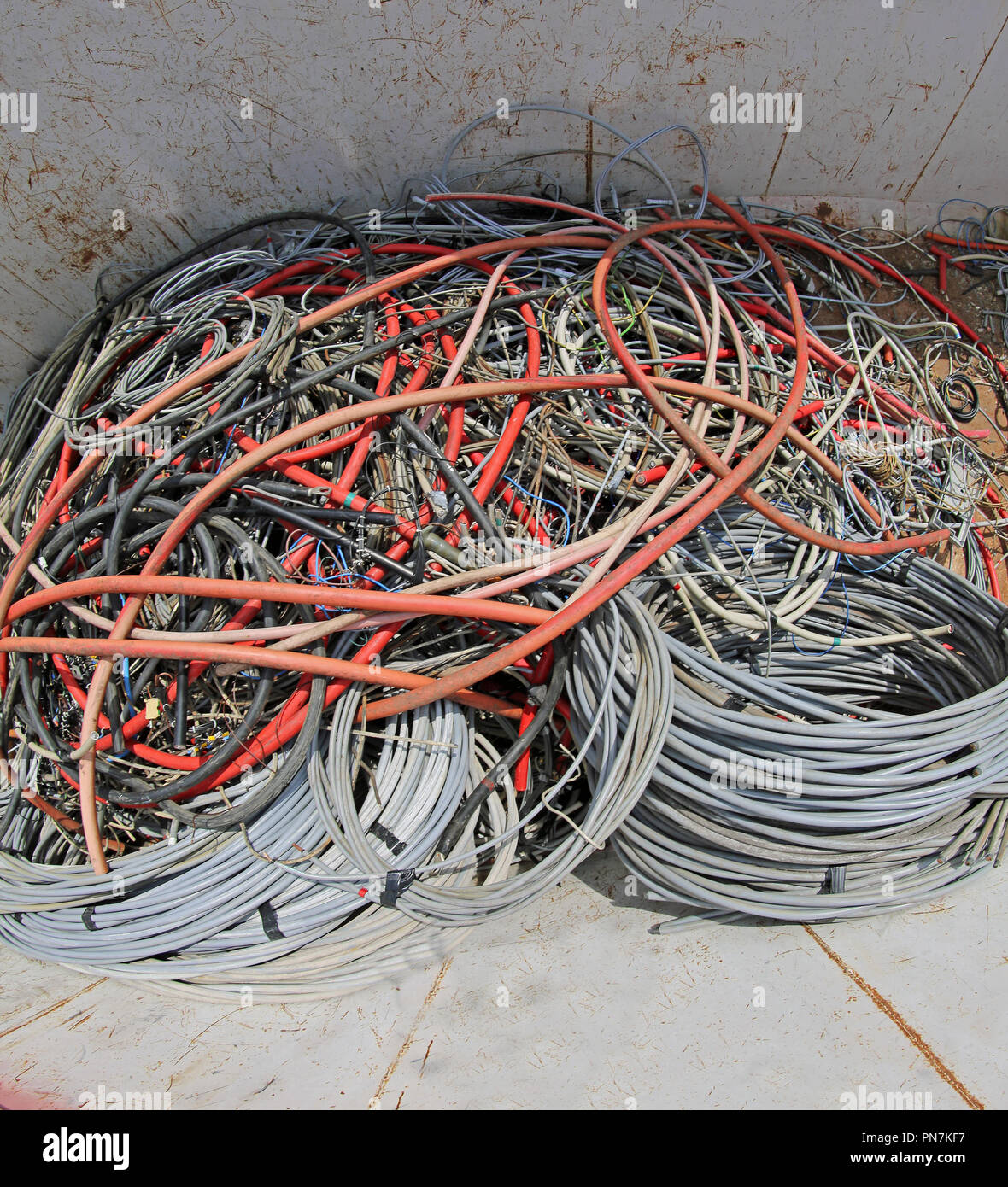 containers with many sections of electric cable and electric wires for ...