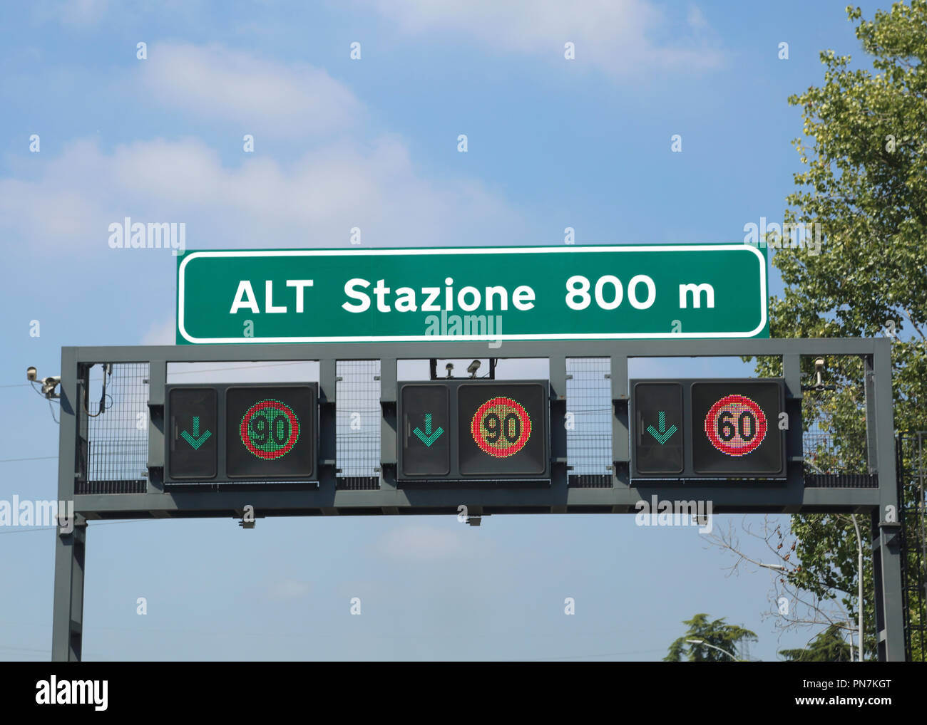 Italian road signs on the highway. The text means STOP Station at 800m ...