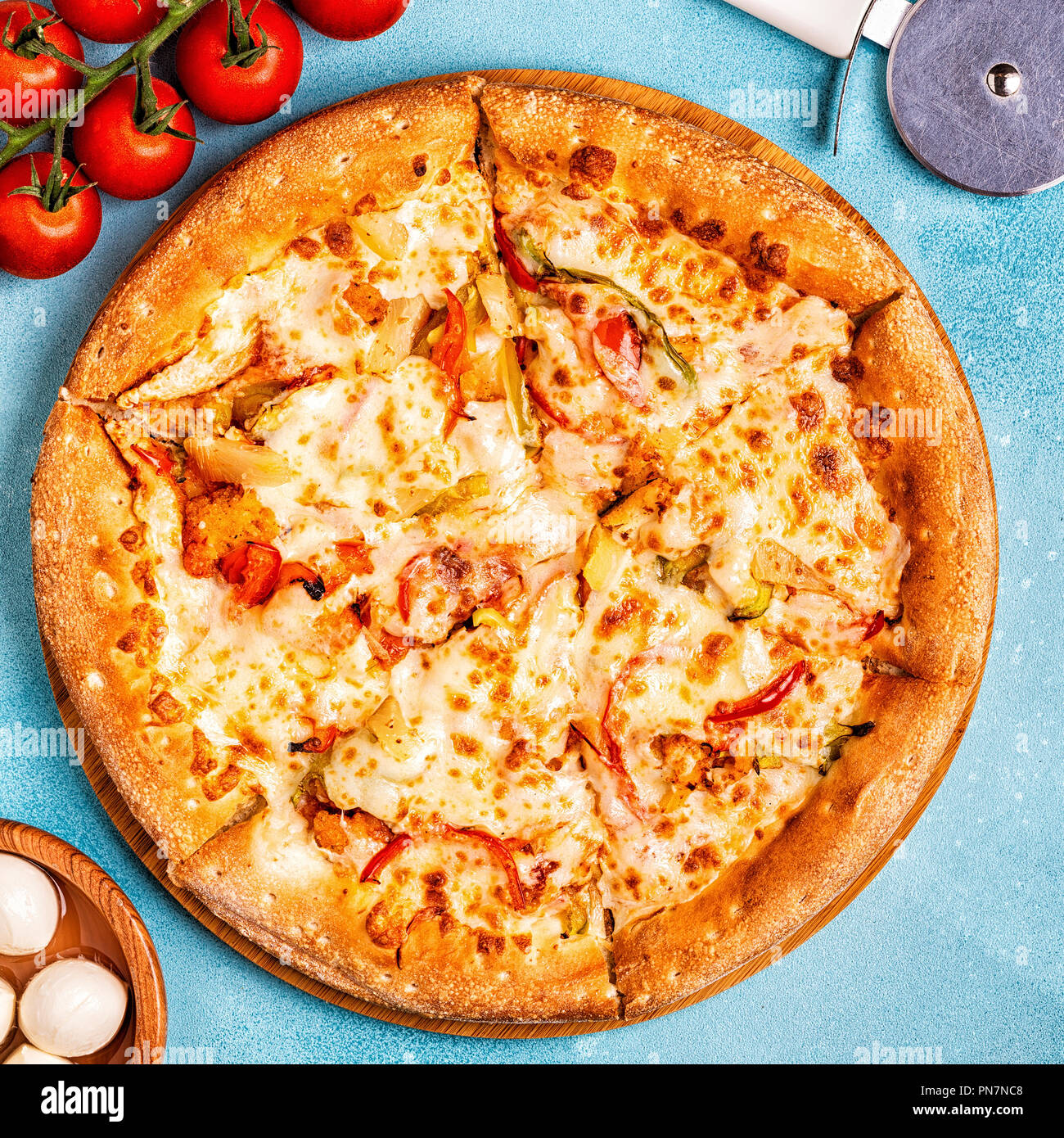 Pizza with chicken, pepper, pineapple, top view Stock Photo - Alamy