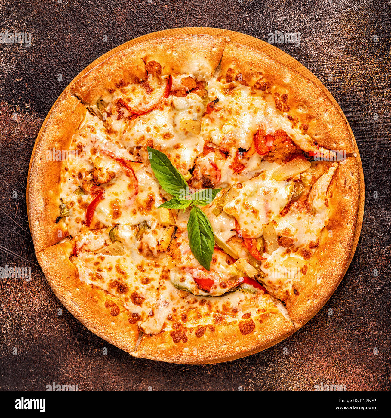 Pizza with chicken, pepper, pineapple, top view Stock Photo - Alamy