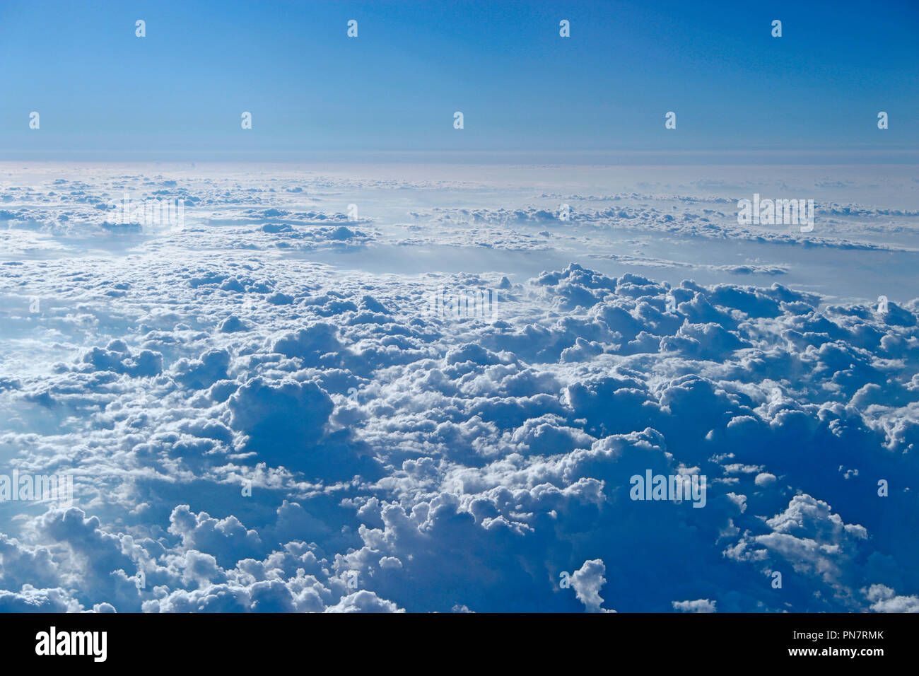 Flight over clouds. Wonderful panorama from window of plane with white ...