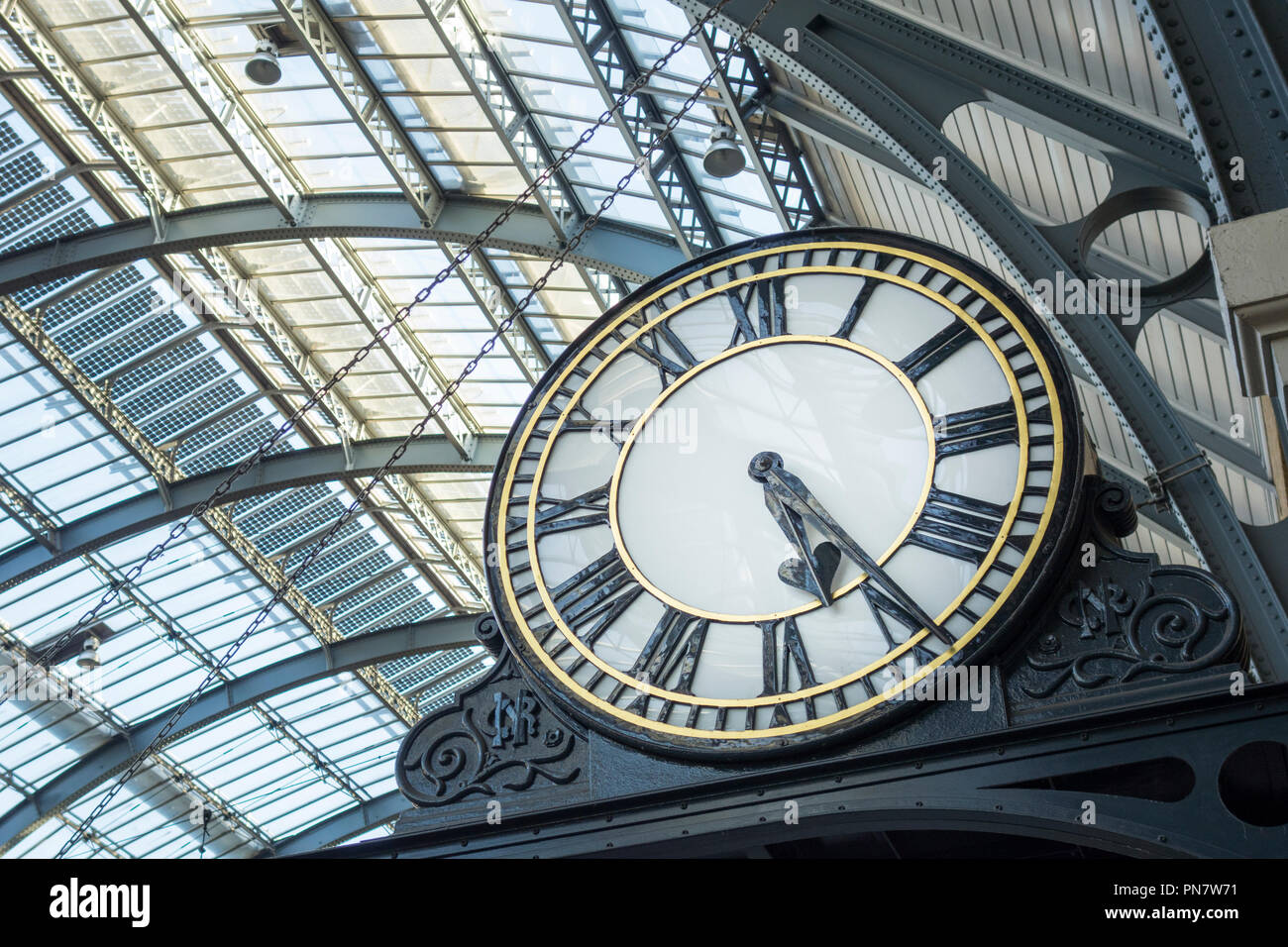Restored projecting platform clock at King's Cross railway station ...