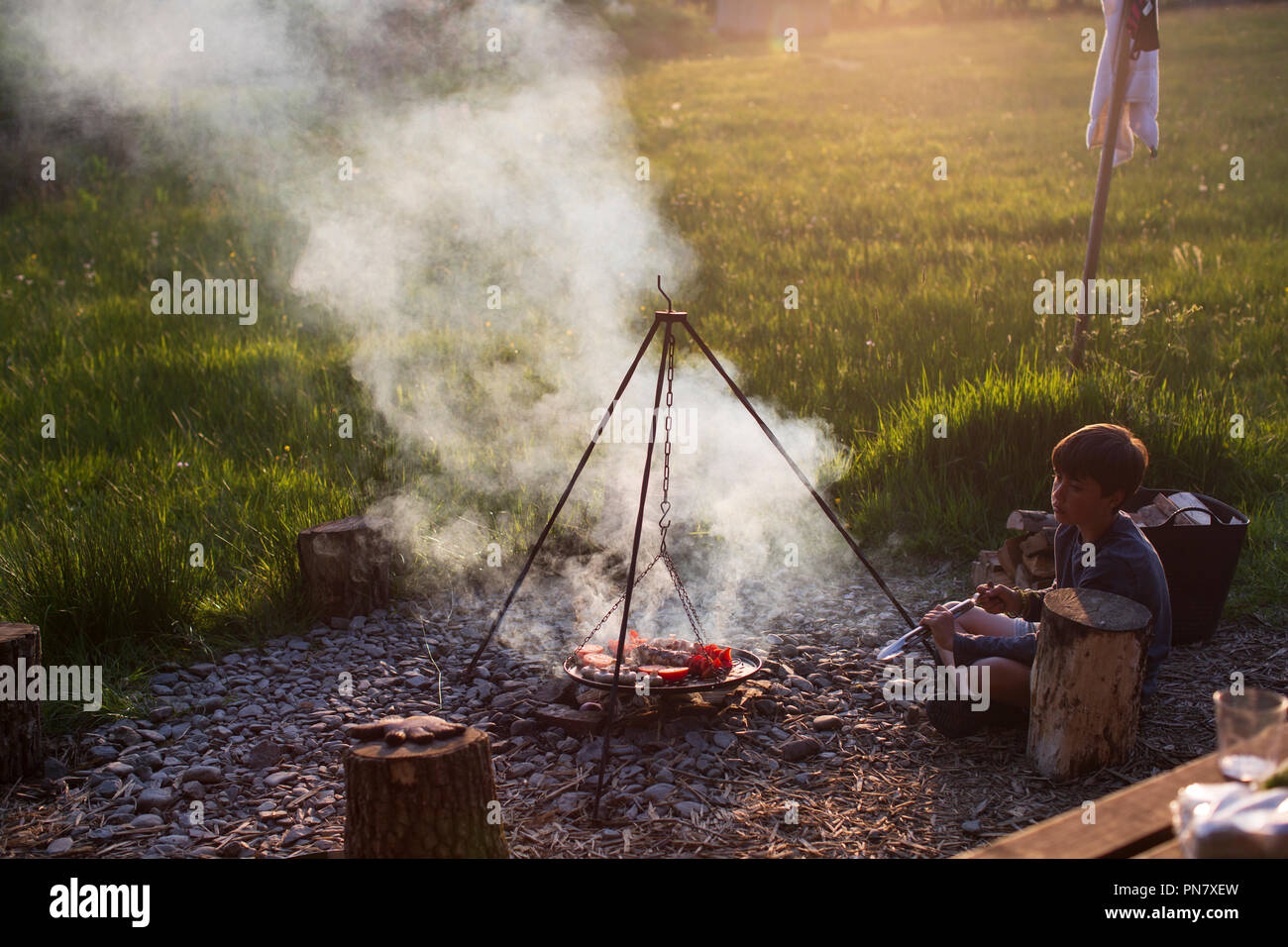 Sitting round the camp fire hi-res stock photography and images - Alamy
