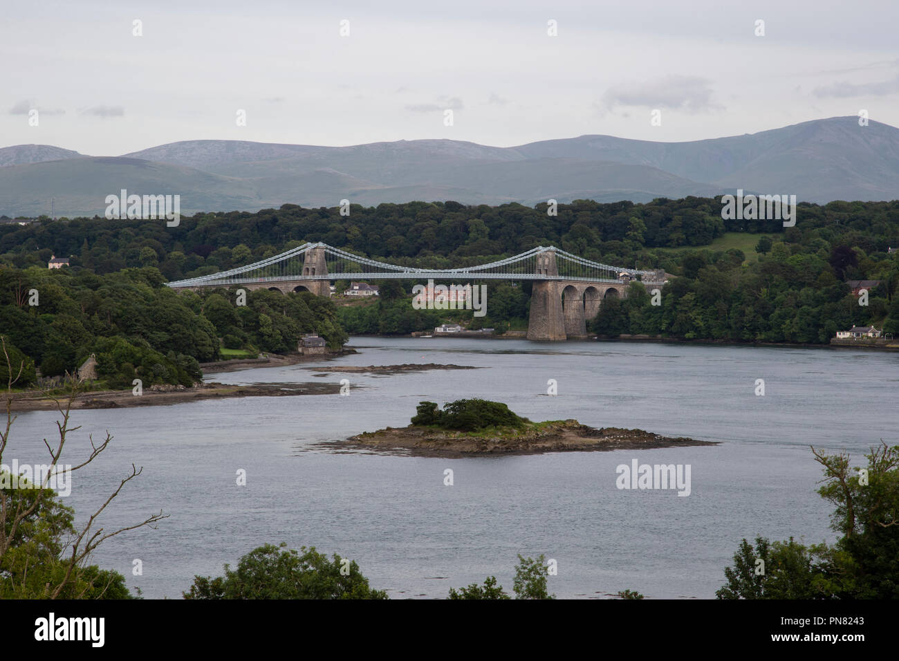 The Menai suspension bridge in North Wales spanning the straits between ...