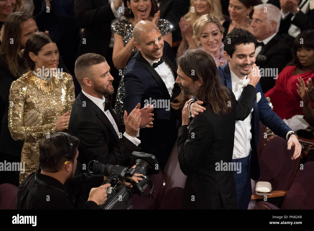 Linus Sandgren embraces Damien Chazelle as he accepts the Oscar® for ...