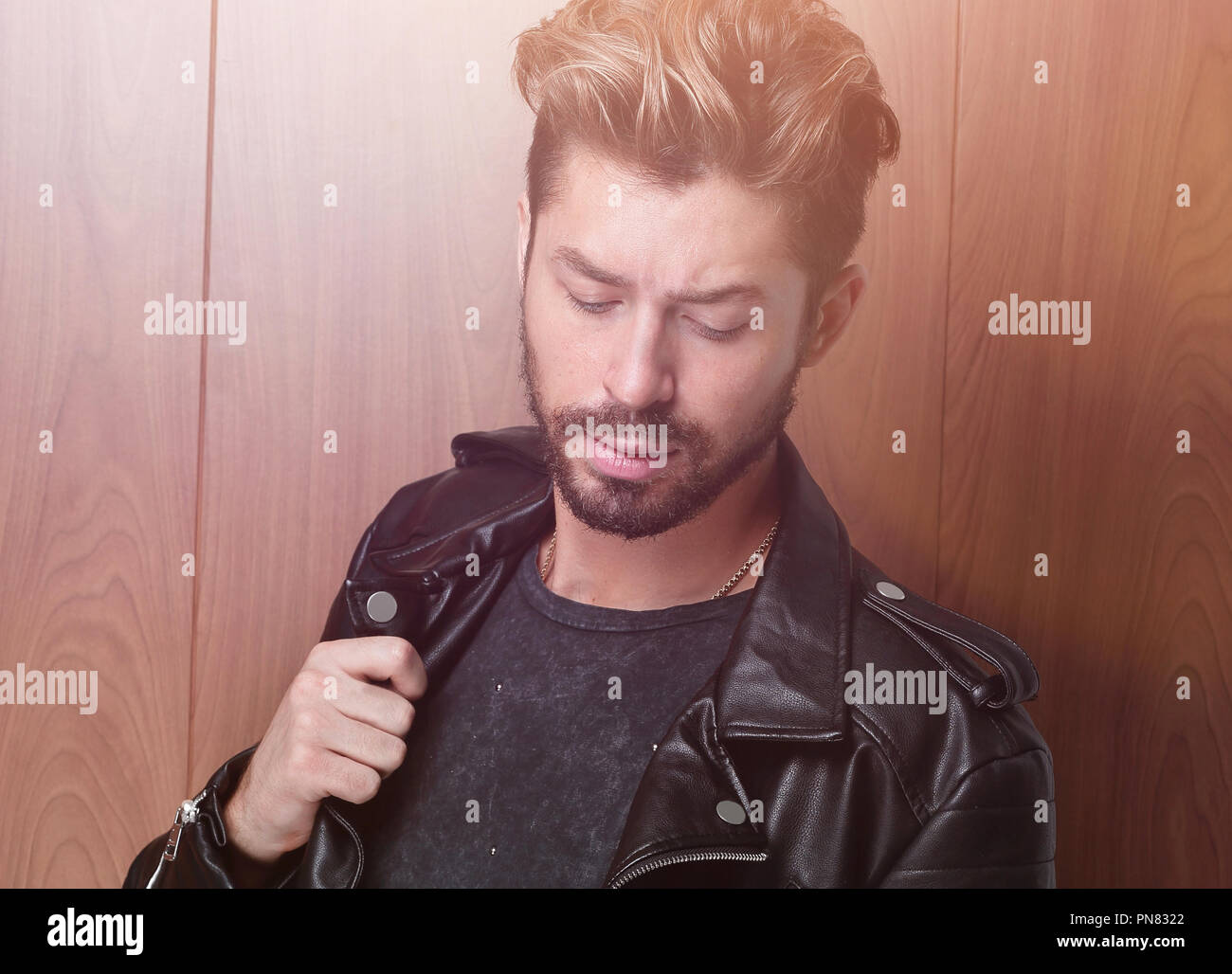 Muscular man in leather jacket hi-res stock photography and images - Alamy
