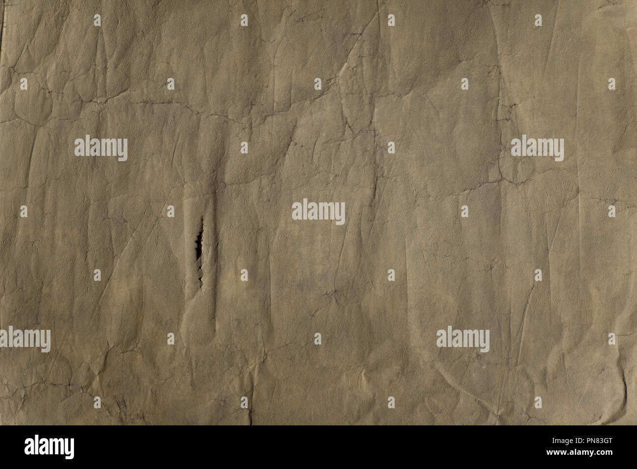 A detail of brown scratched paper background Stock Photo - Alamy